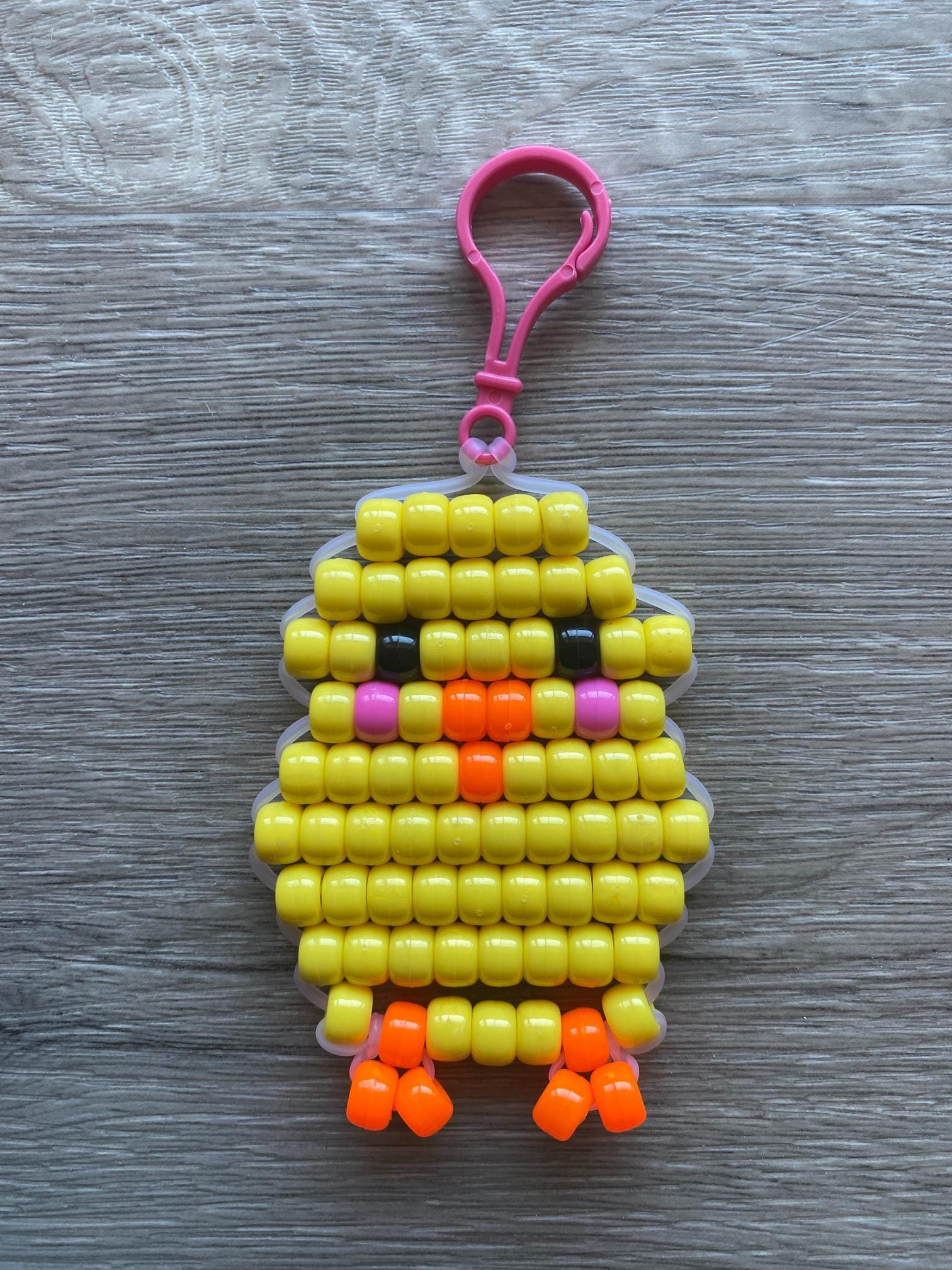How to Make a Pony Bead Baby Chick Bead Buddy - Crafting Through Life
